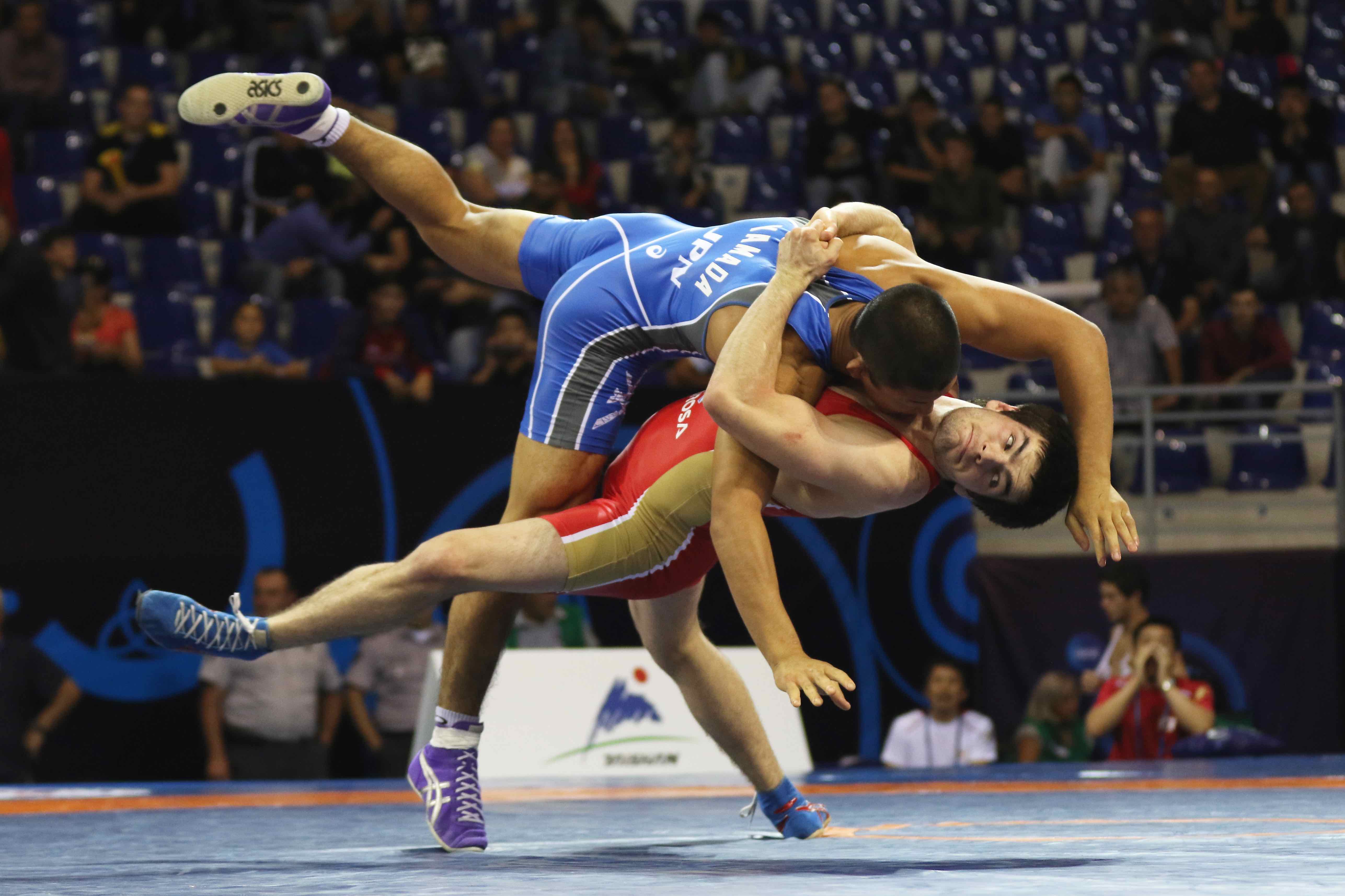 Russia advanced three wrestlers to the five final gold medal matches on ...