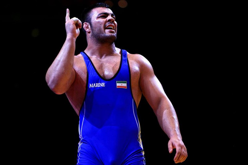 CORSIER-SUR-VEVEY, SWITZERLAND—Iranian wrestler Amir Aziz Ali Akbari ...