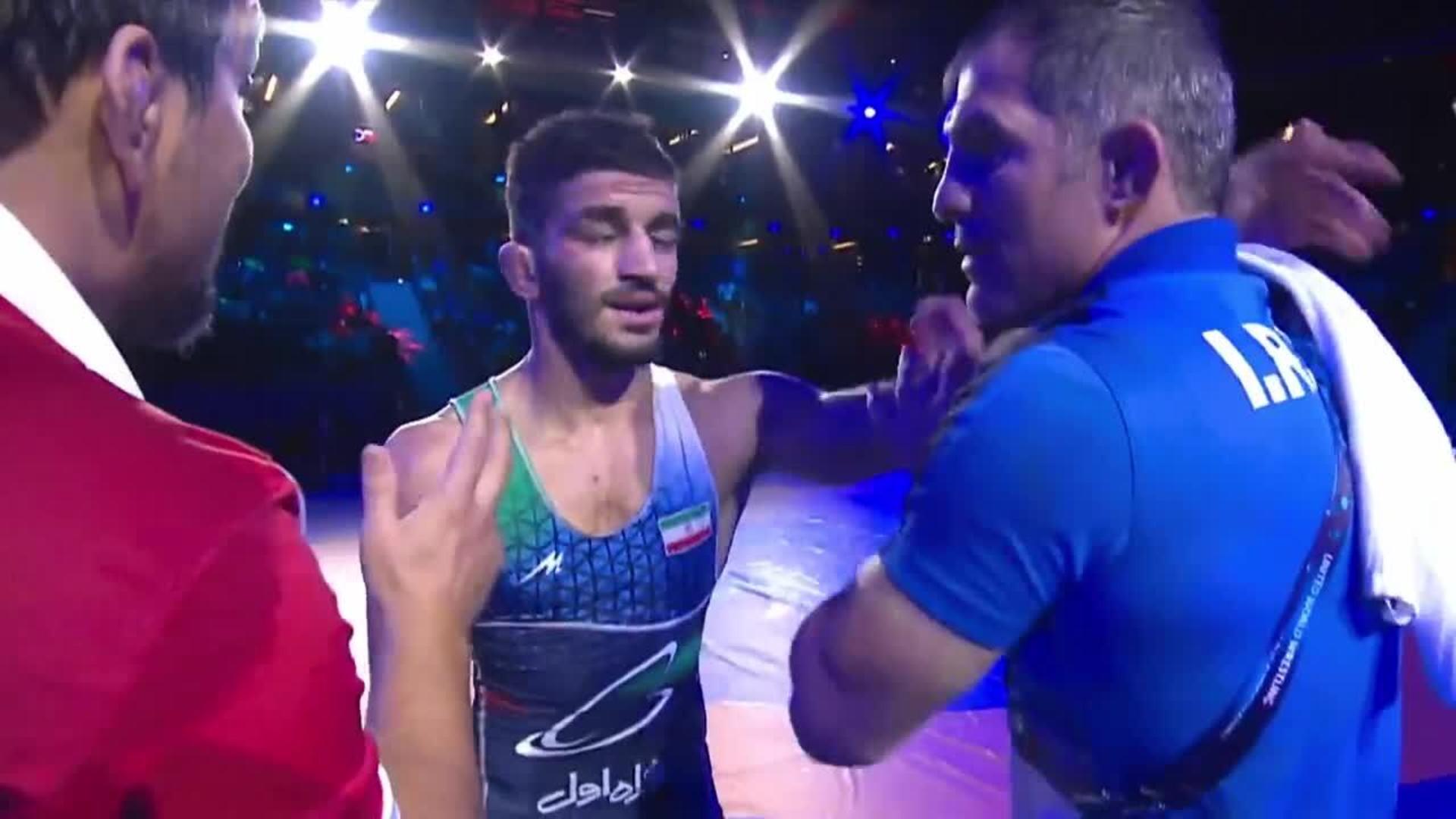 GOLD FS - 57 kg: T. GILMAN (USA) v. A. SARLAK (IRI)