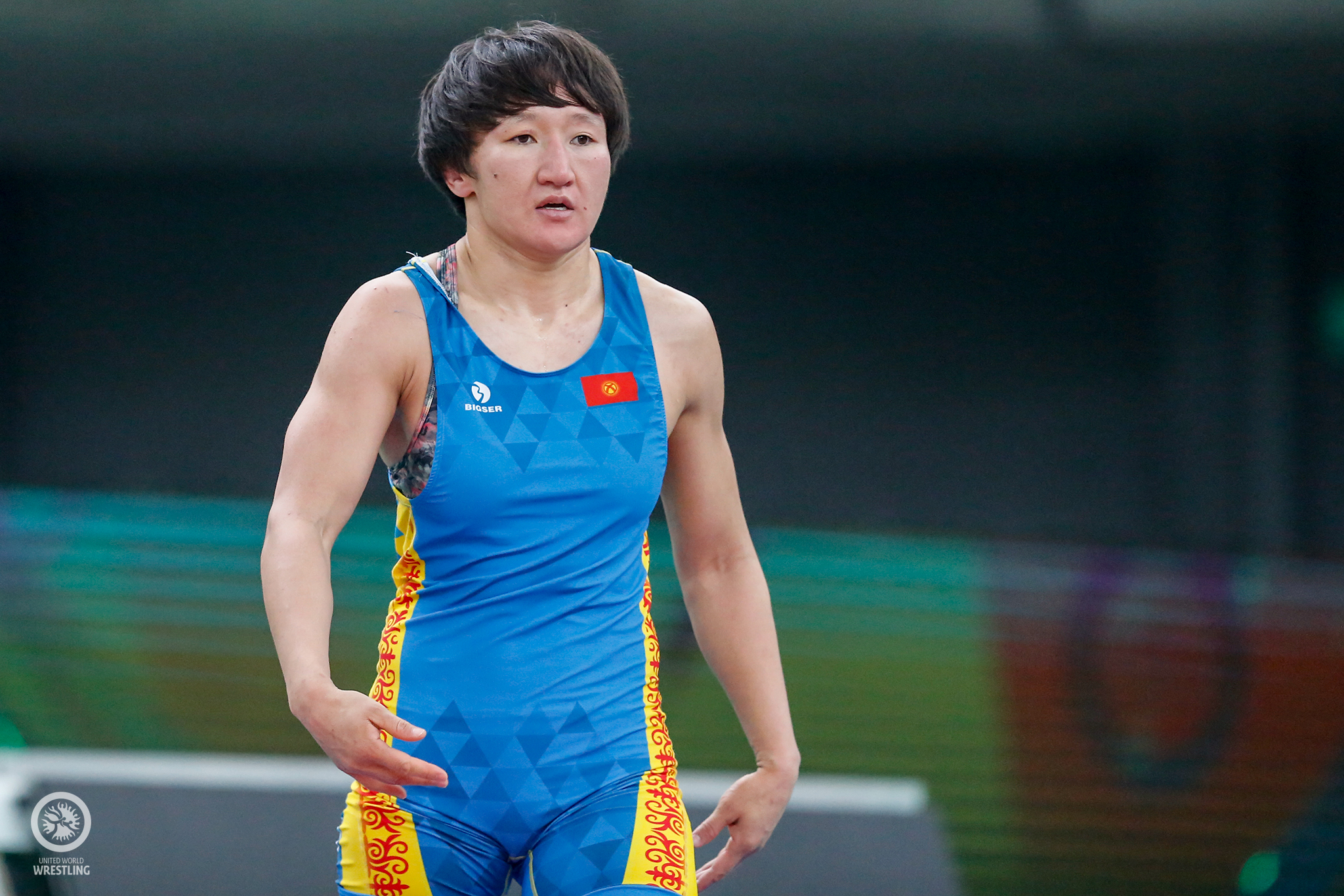 Aisuluu TYNYBEKOVA (KGZ), who made history by becoming Kyrgyzstan's first world champion, stands ...